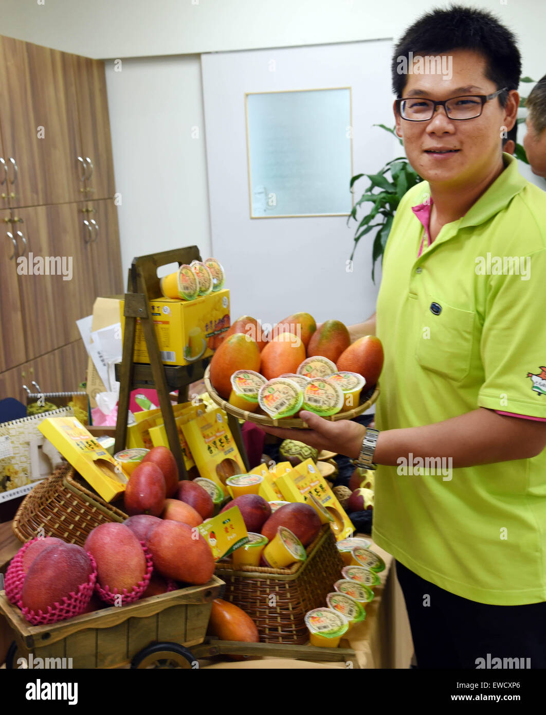 Taipei's Taiwan. 23rd June, 2015. A farmer shows mango jelly during a ...