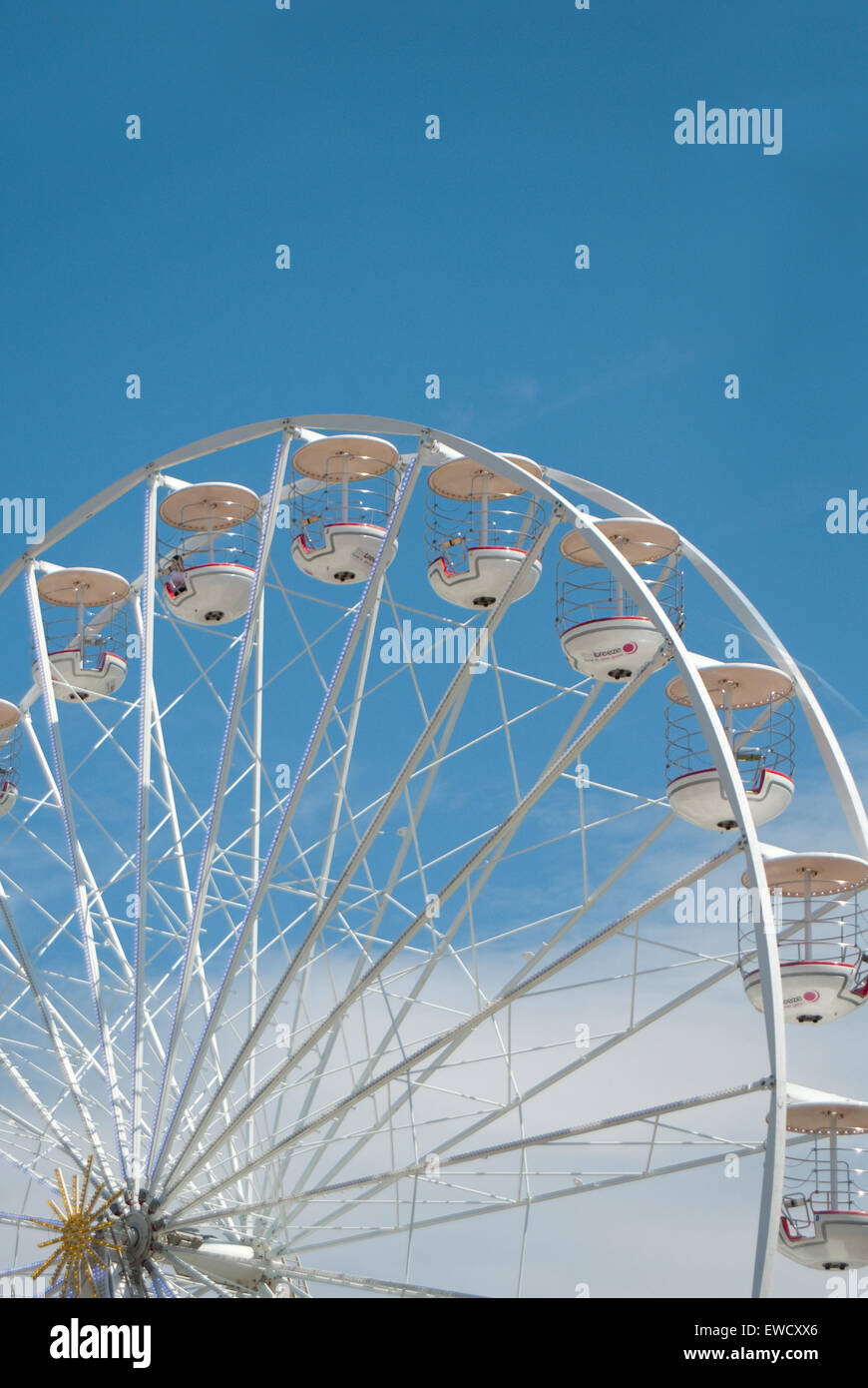Big Wheel pods against a vivid blue sky Stock Photo - Alamy