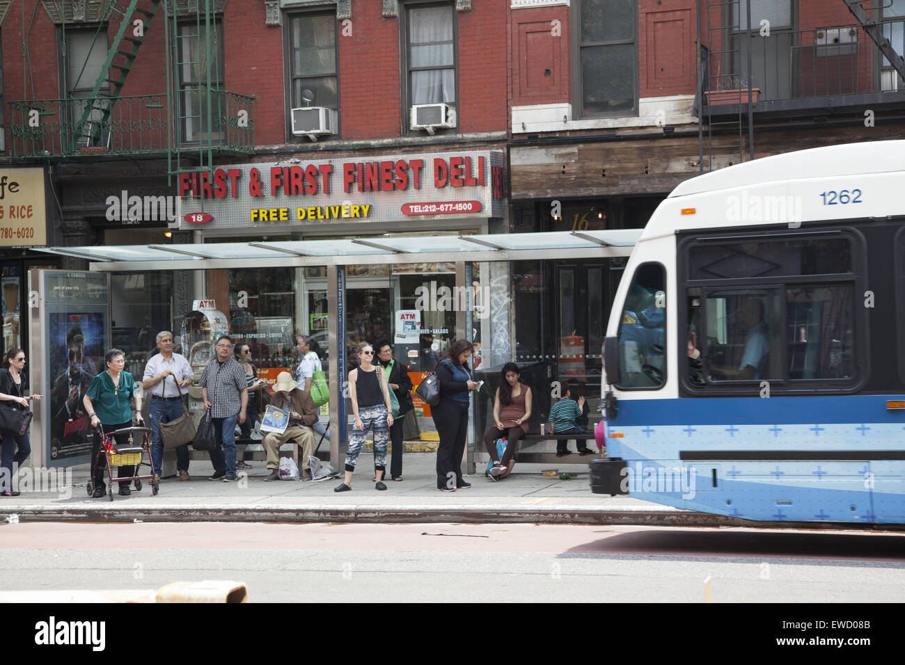 People waiting for bus stop hi-res stock photography and images - Alamy