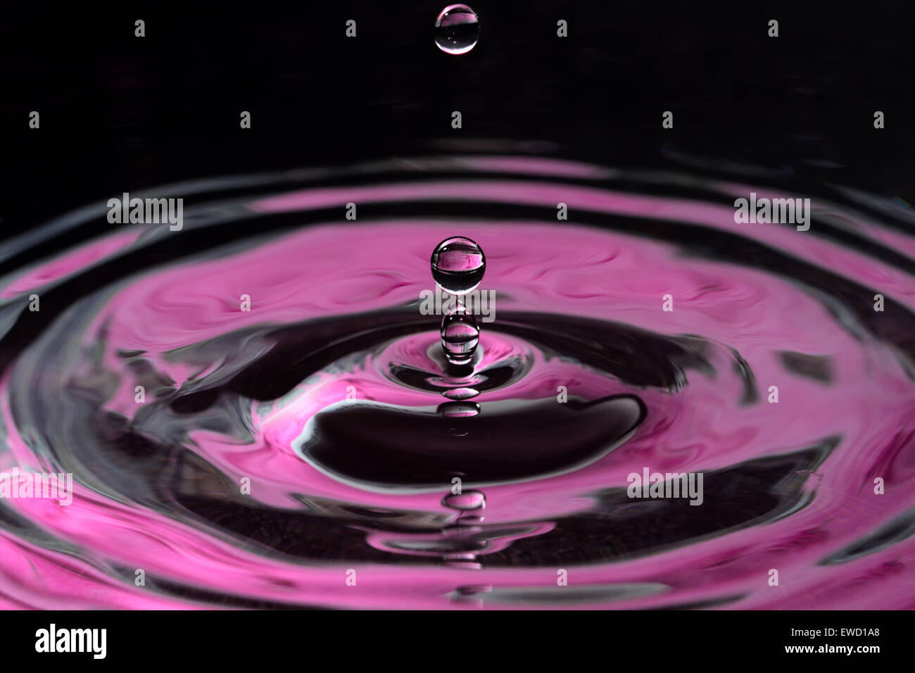 water drop falling over water Stock Photo - Alamy