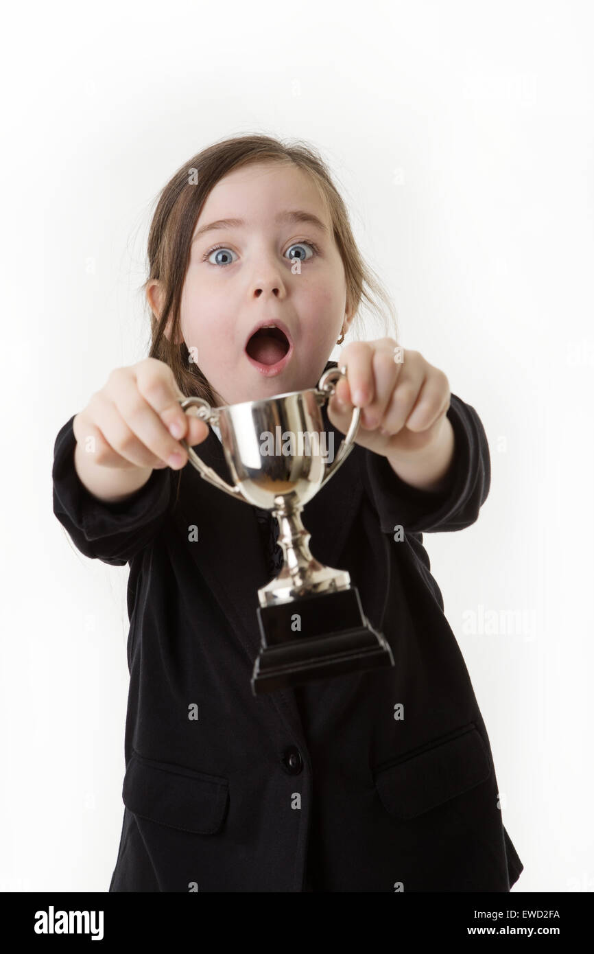 happy and surprise girl holding a trophy Stock Photo - Alamy