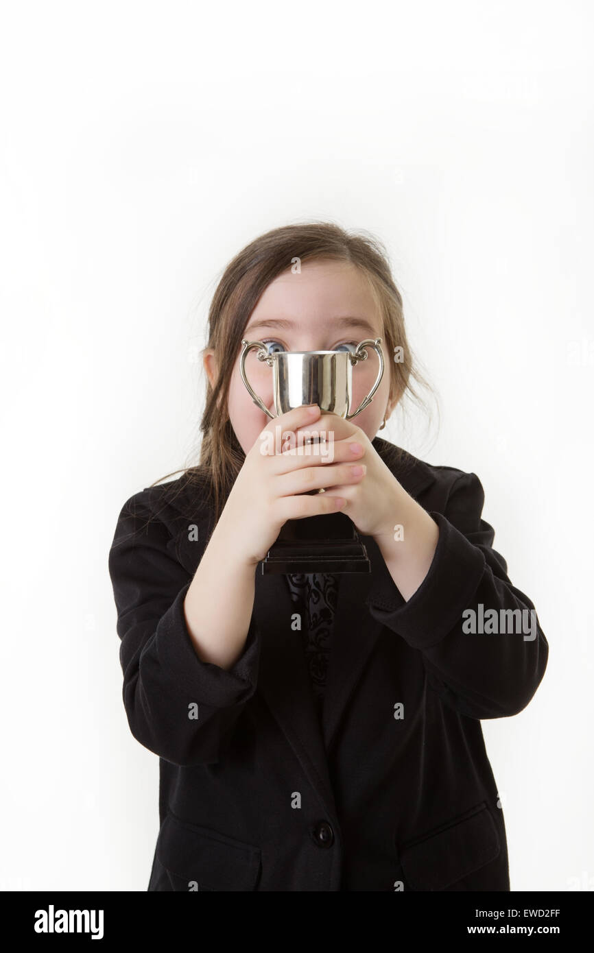 happy and surprise girl holding a trophy Stock Photo - Alamy