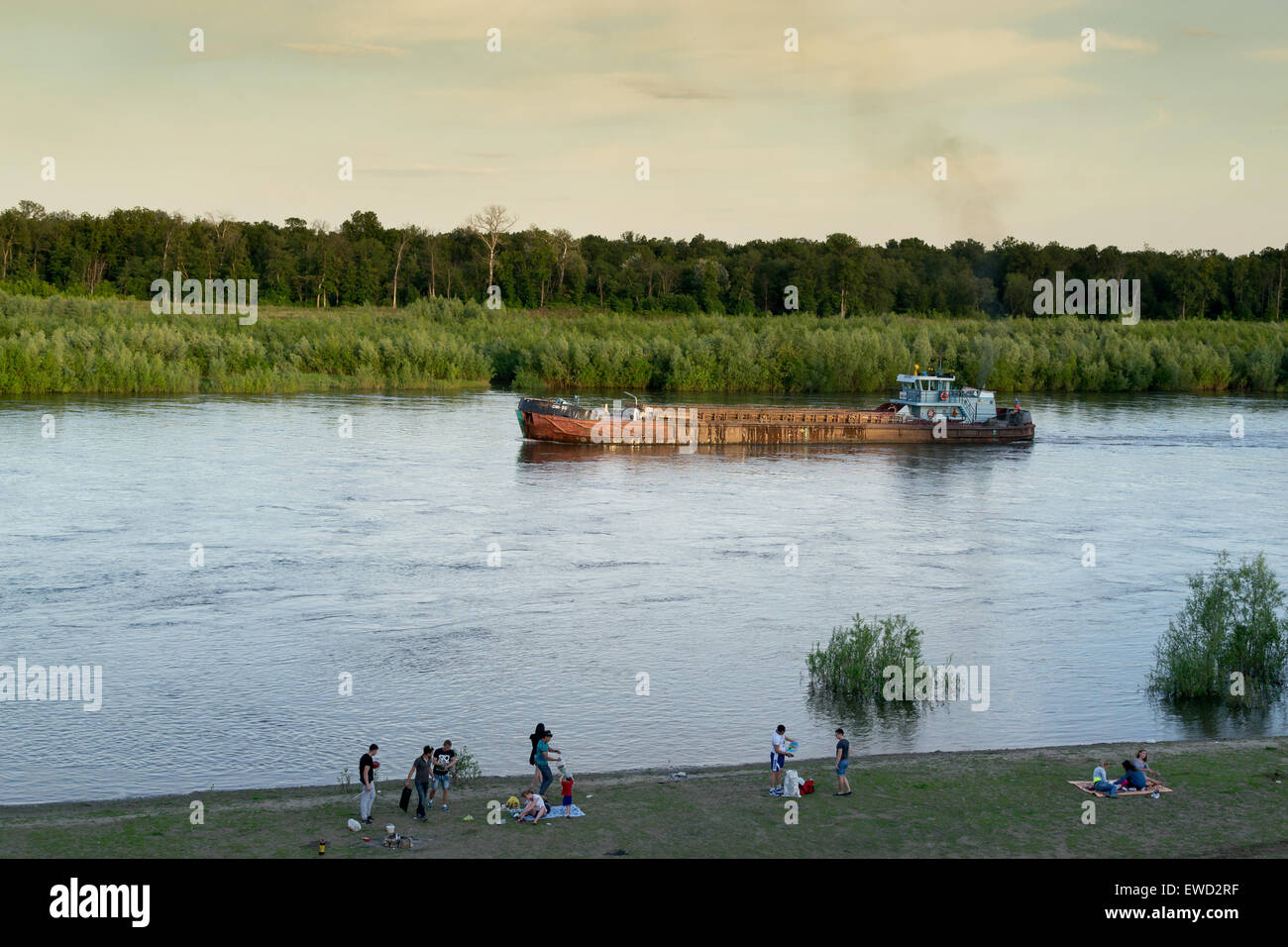 Boat sailing on a river Stock Photo - Alamy