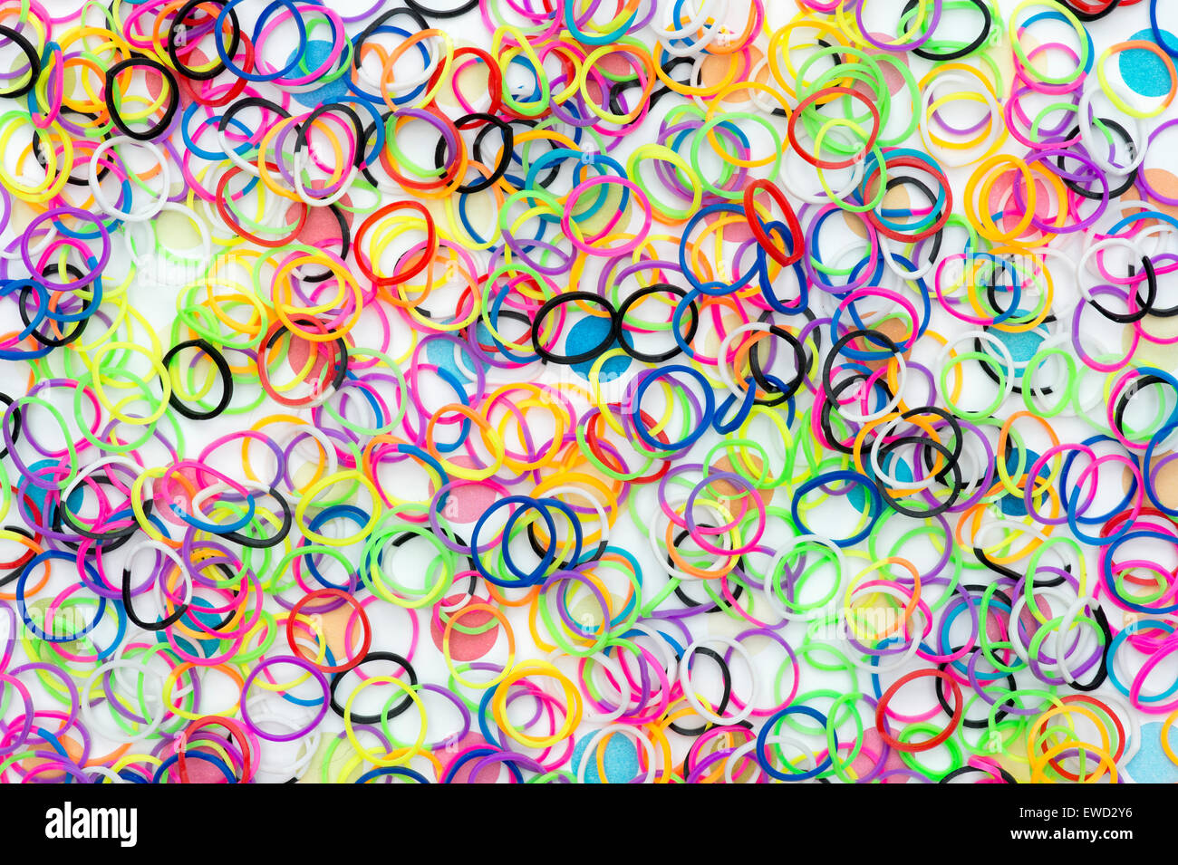 Colourful Loom bands pattern on white background Stock Photo - Alamy