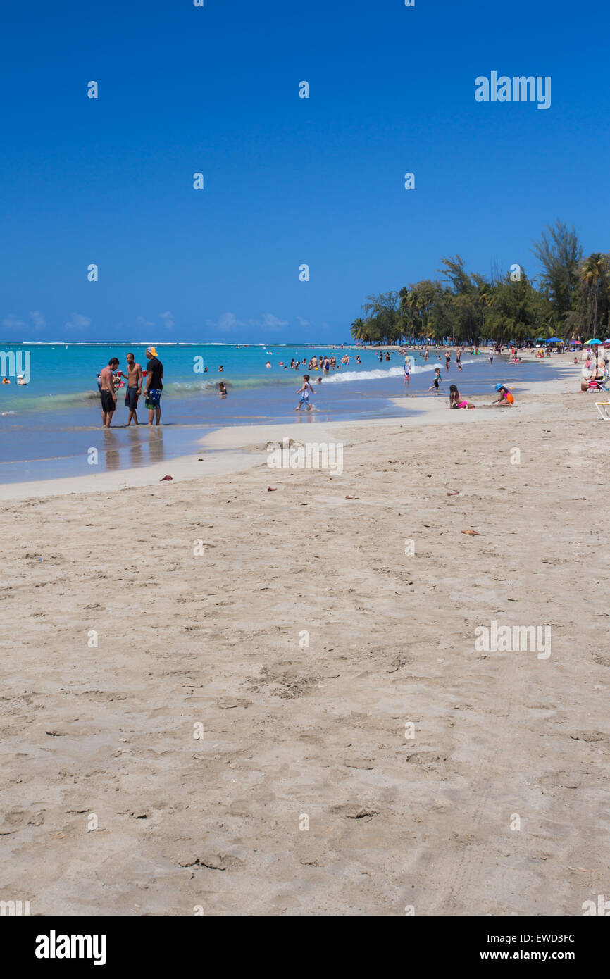 LUQUILLO BEACH, PUERTO RICO - MARCH 28, 2015: View sand and shore with ...
