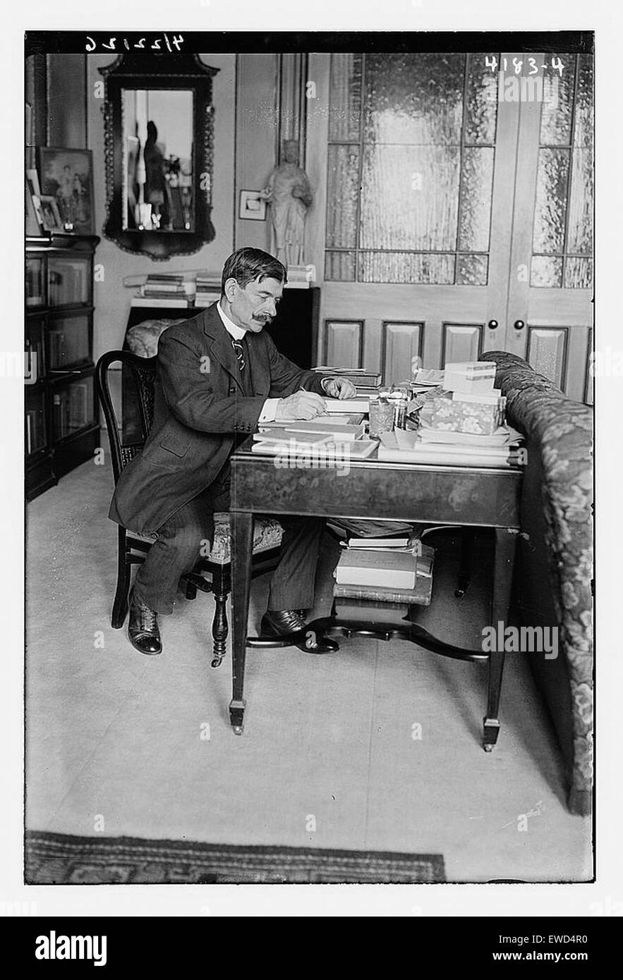 Unknown man seated in Black and White Stock Photos & Images - Alamy