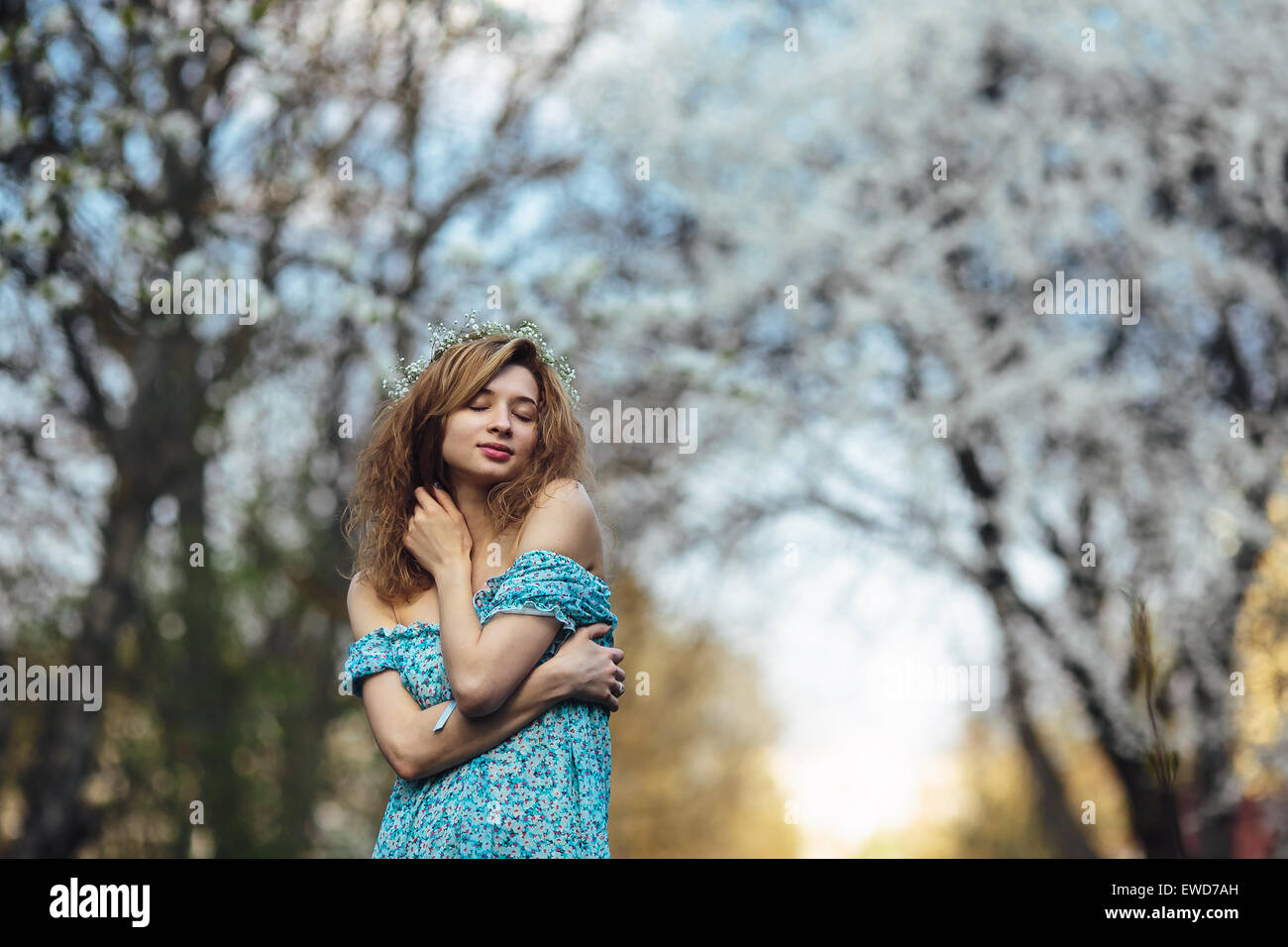 Portrait of a beautiful girl flowering trees Stock Photo - Alamy