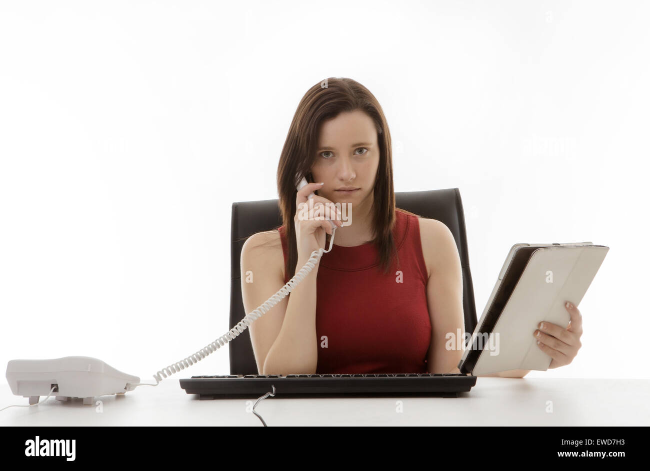 busy woman working at her desk Stock Photo - Alamy
