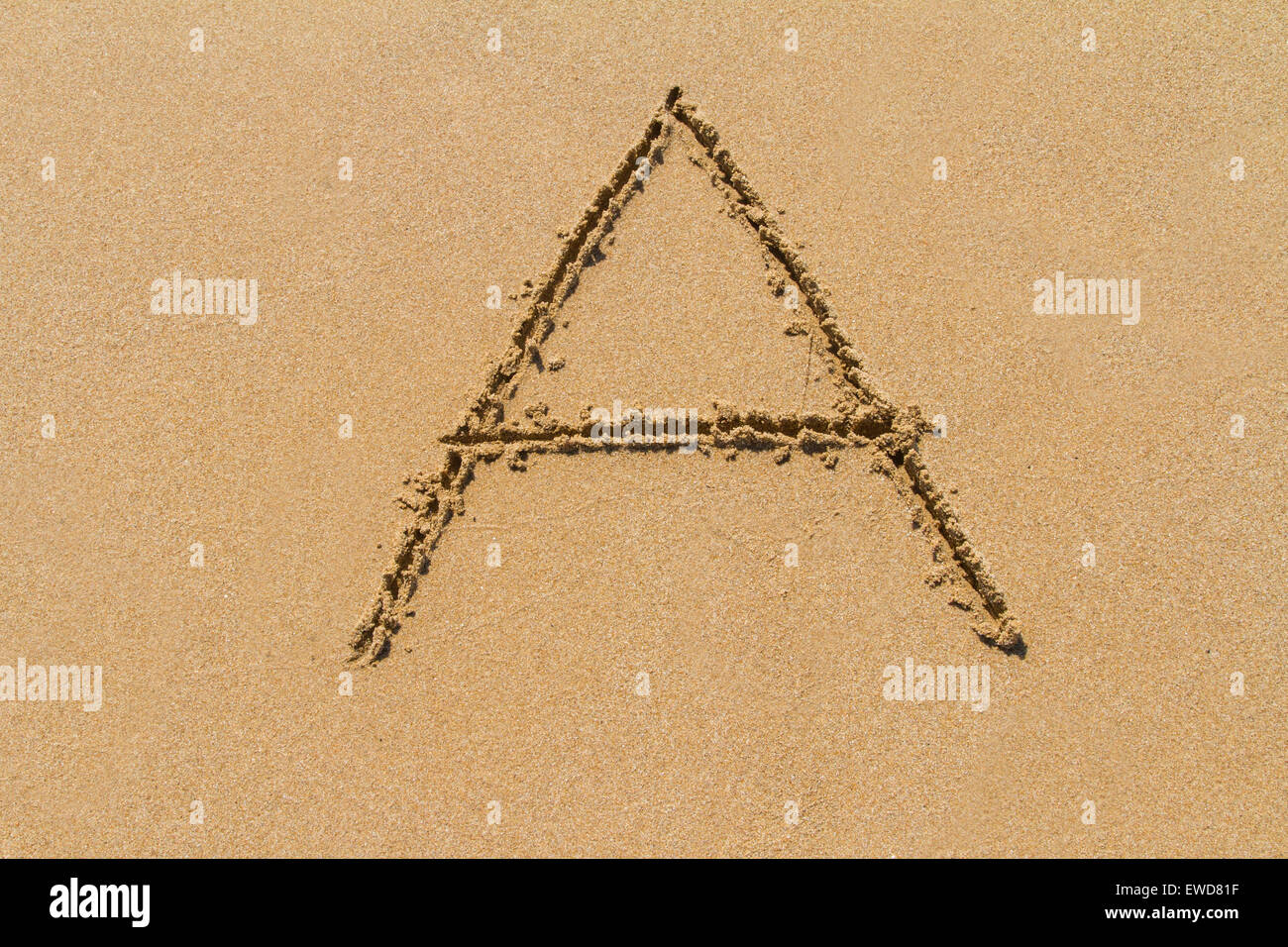 Letter A of the alphabet written on sand with upper case Stock Photo ...