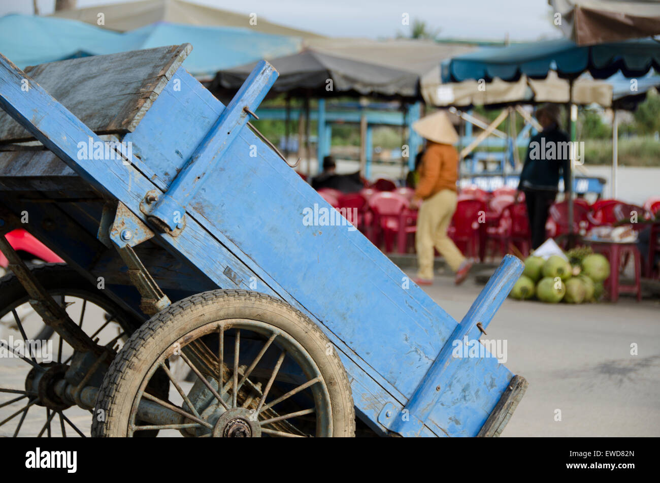 Old blue cart at asian market Stock Photo - Alamy