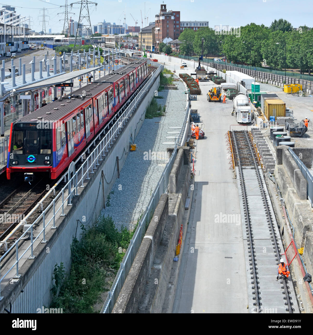 Crossrail train tracks being laid beside existing DLR train tracks on ...