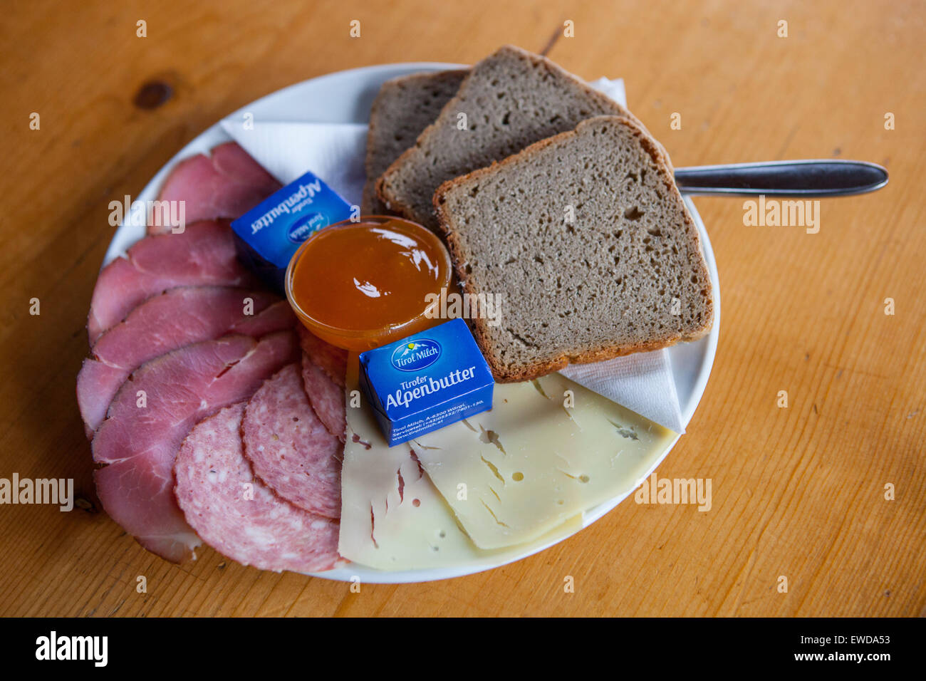 A typical Tyrolean breakfast served in a mountain hut during the ...