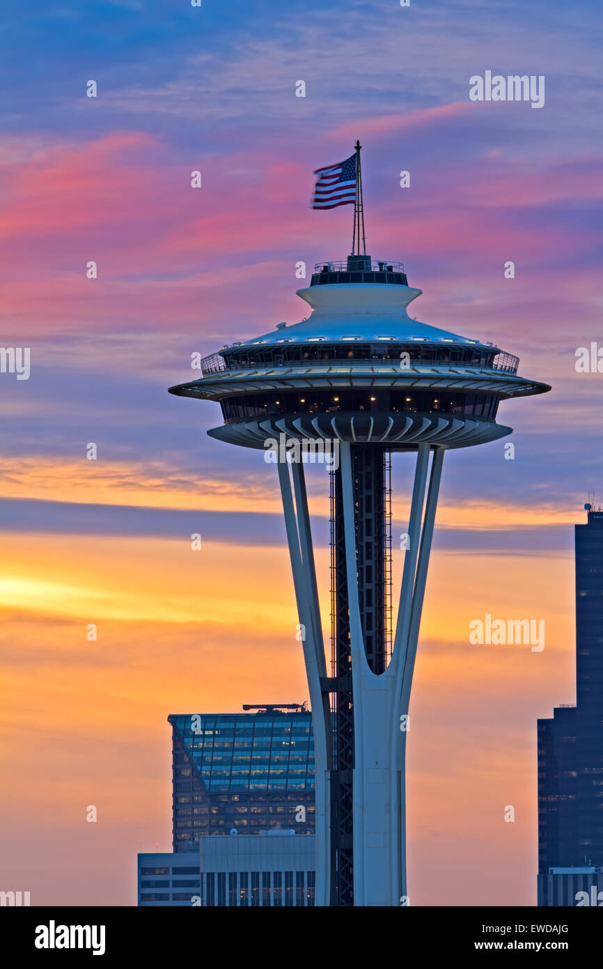 Space Needle with a waving american flag, Seattle's landmark at sunrise ...