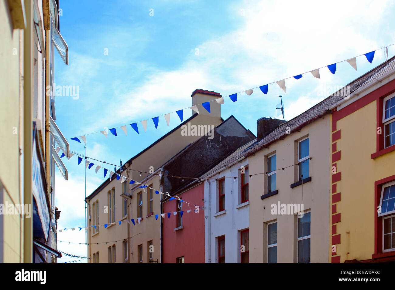 Flags are strung above shops and homes in the small town of Killarney ...