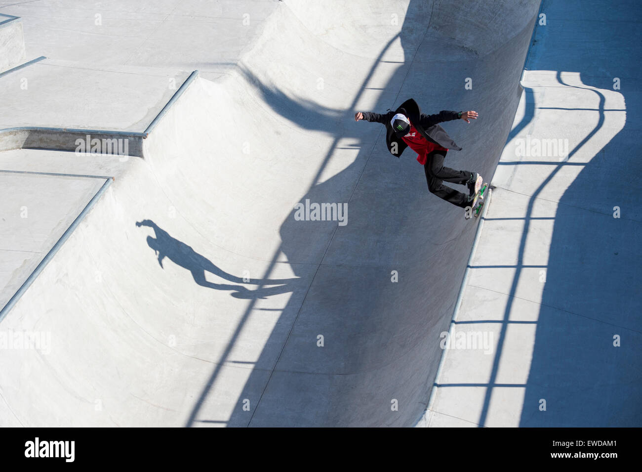 Male skater riding on a bowl Stock Photo - Alamy