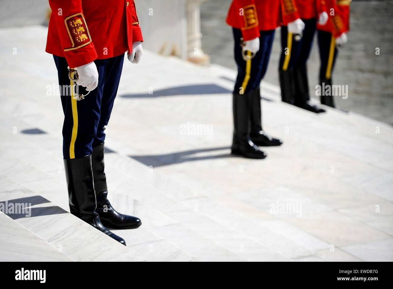 Military honor guards with swords on marble stairs Stock Photo - Alamy