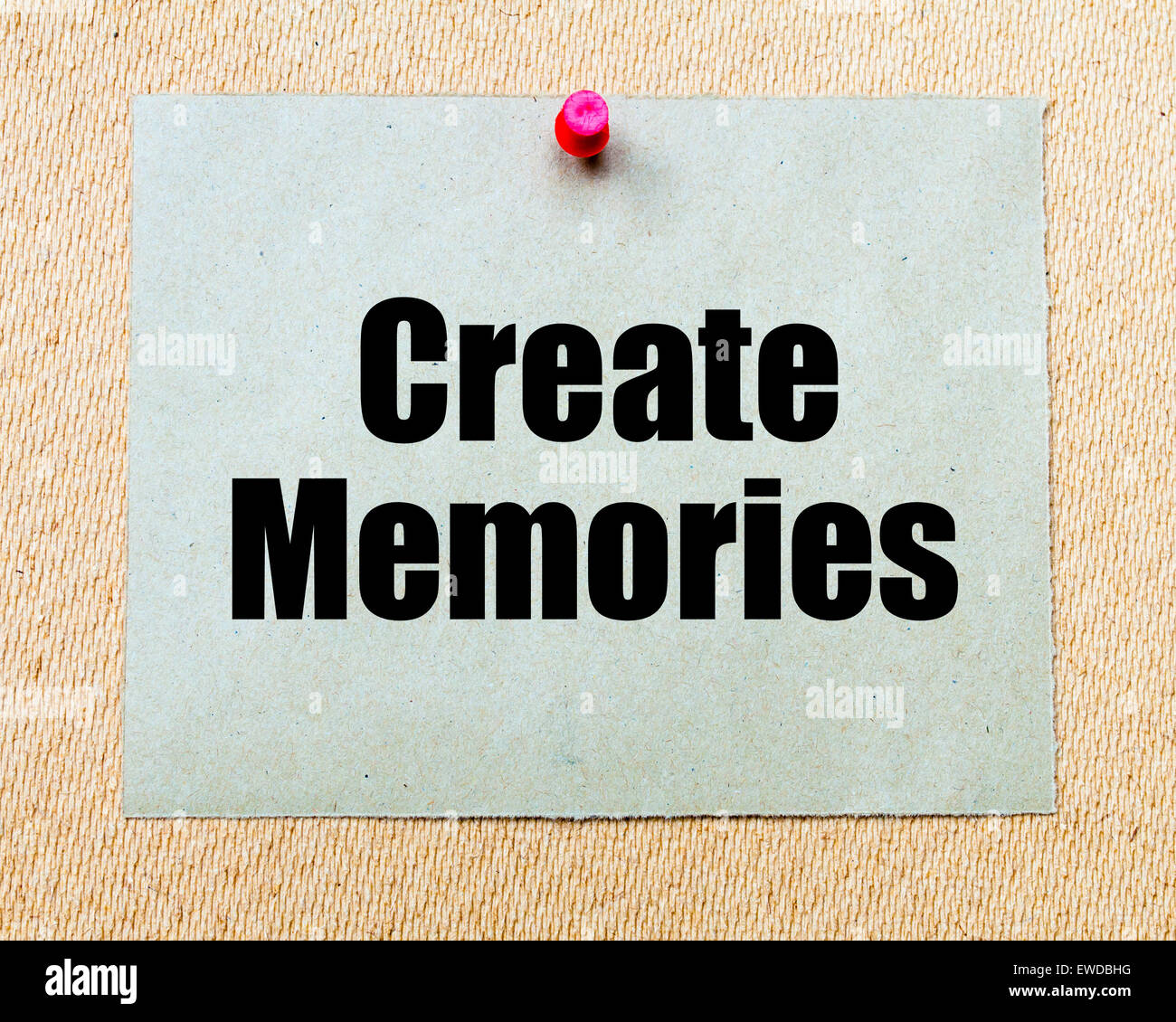 Create Memories written on paper note pinned with red thumbtack on ...