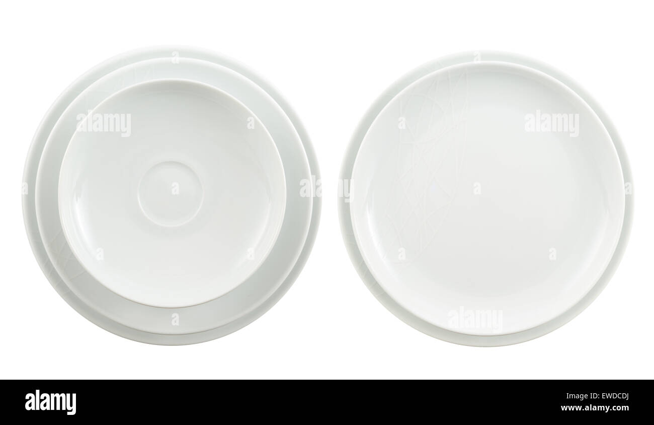 Round ceramic white plate stack isolated Stock Photo - Alamy