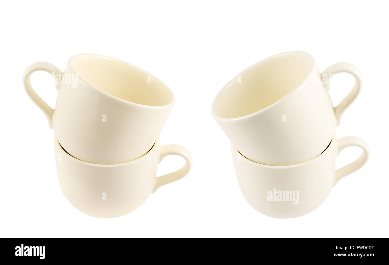 Ceramic cream colored cup pile isolated Stock Photo - Alamy
