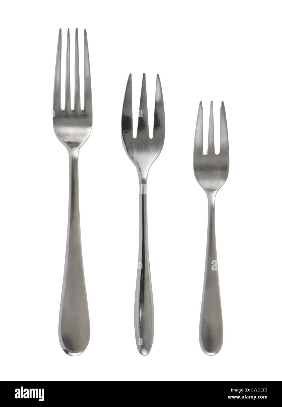 Set of metal table and dessert forks Stock Photo - Alamy