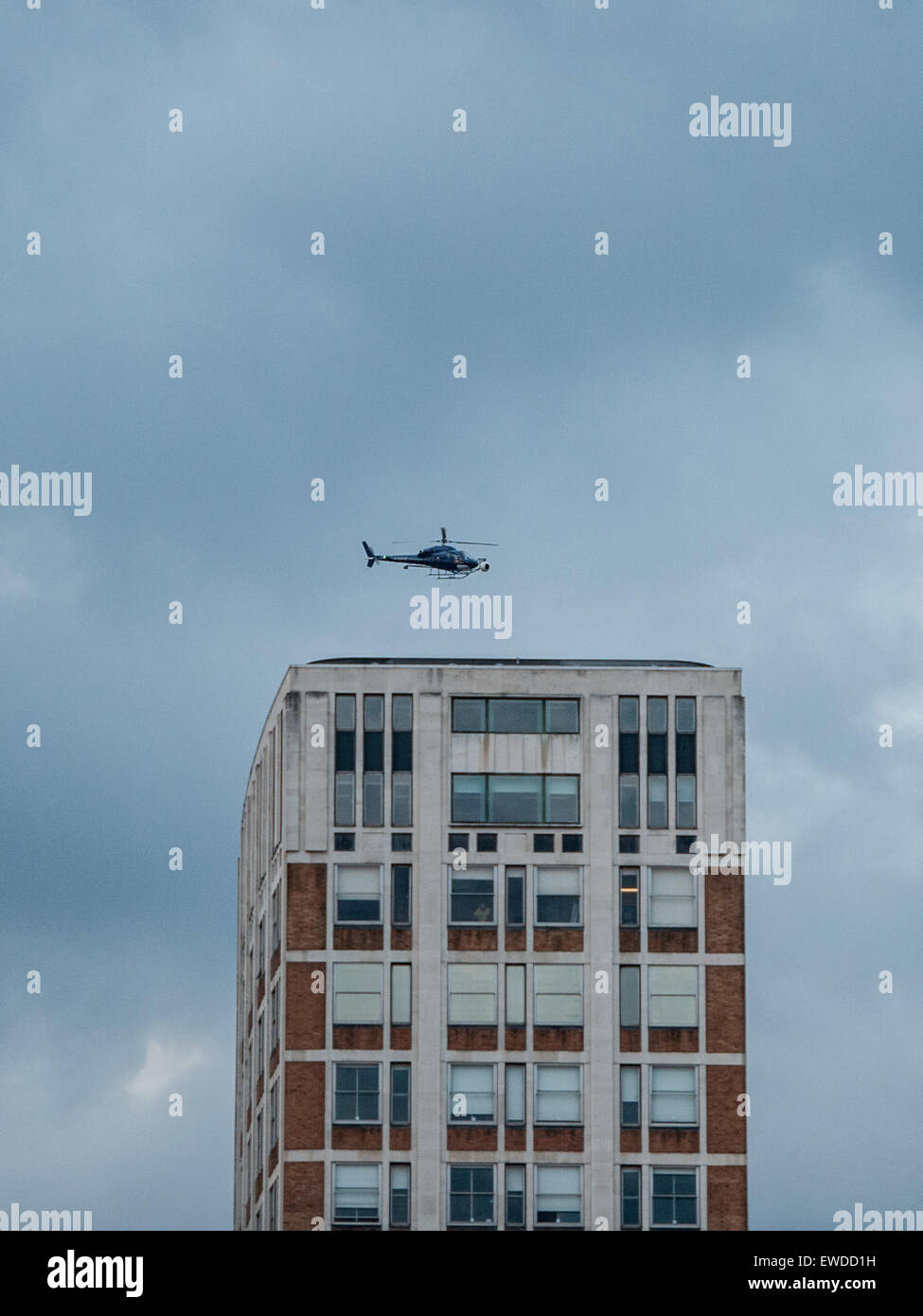 London, UK. 22 June, 2015. A helicopter flies over the MI6 building ...
