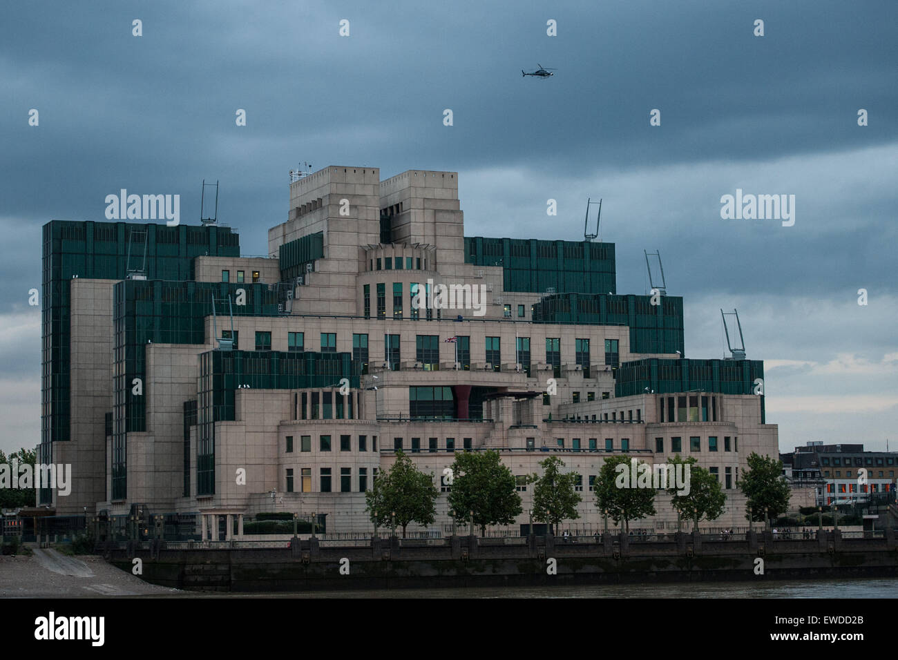 London, UK. 22 June, 2015. A helicopter flies over the MI6 building ...