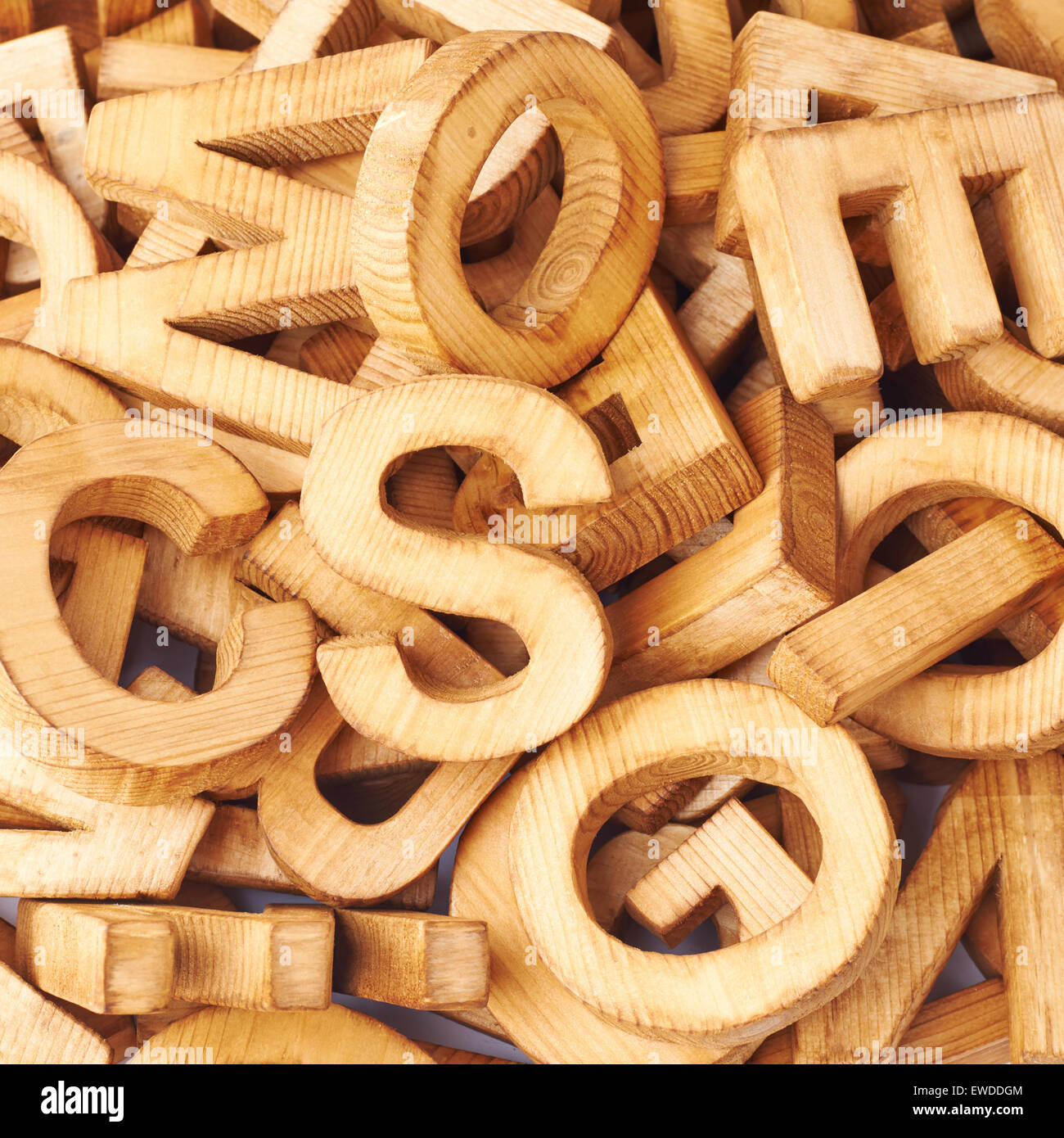 Surface covered with multiple wooden letters Stock Photo - Alamy