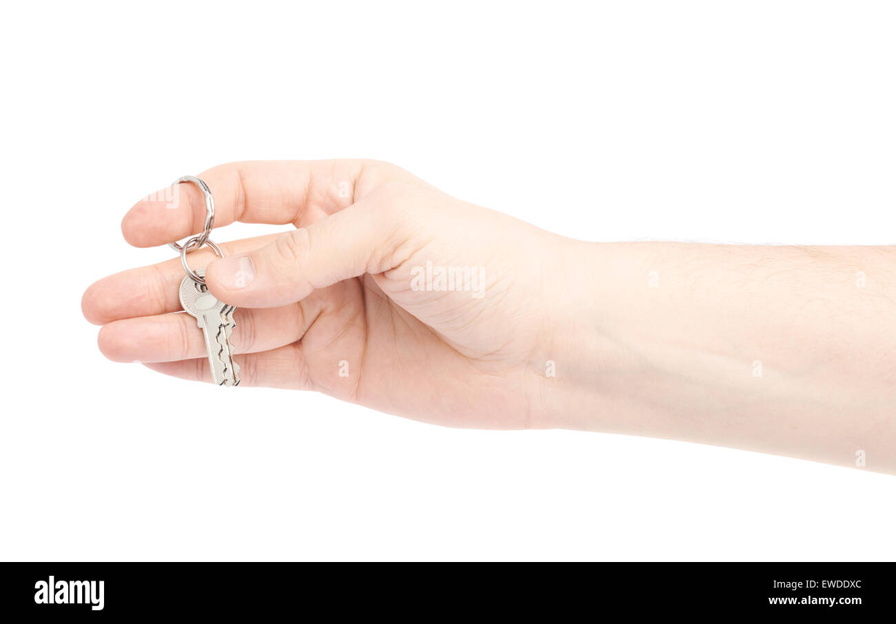 Hand holding a small key Stock Photo - Alamy