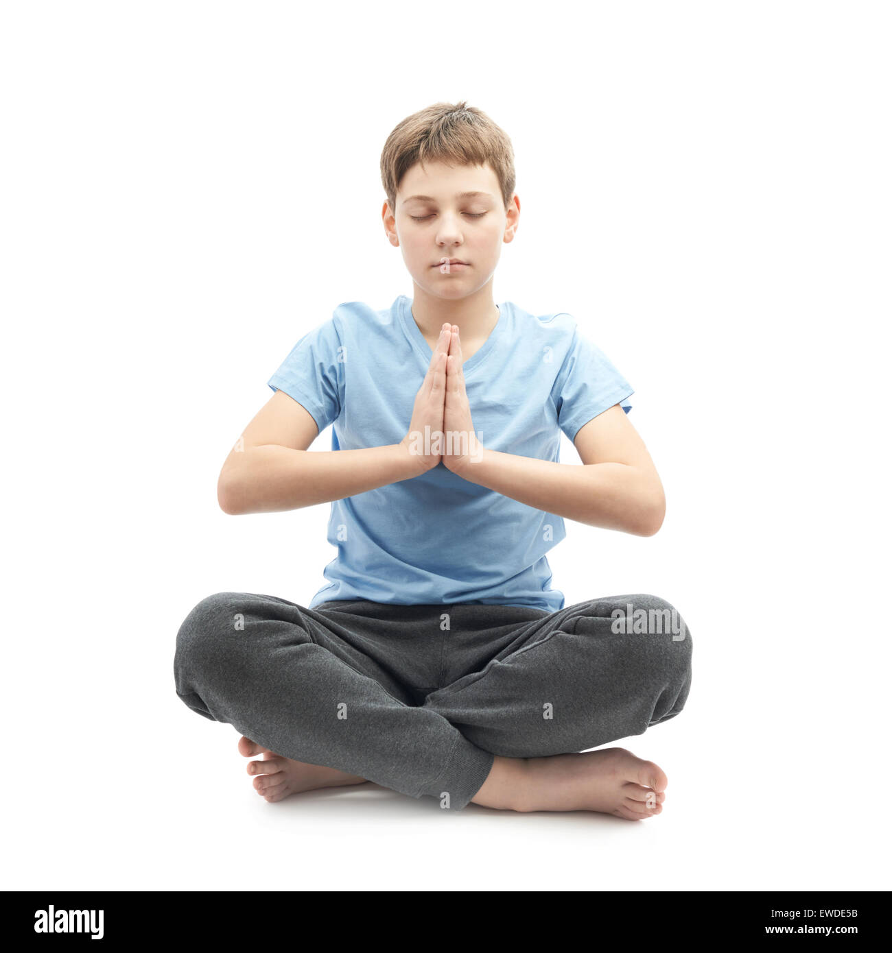 Young boy doing yoga Stock Photo - Alamy