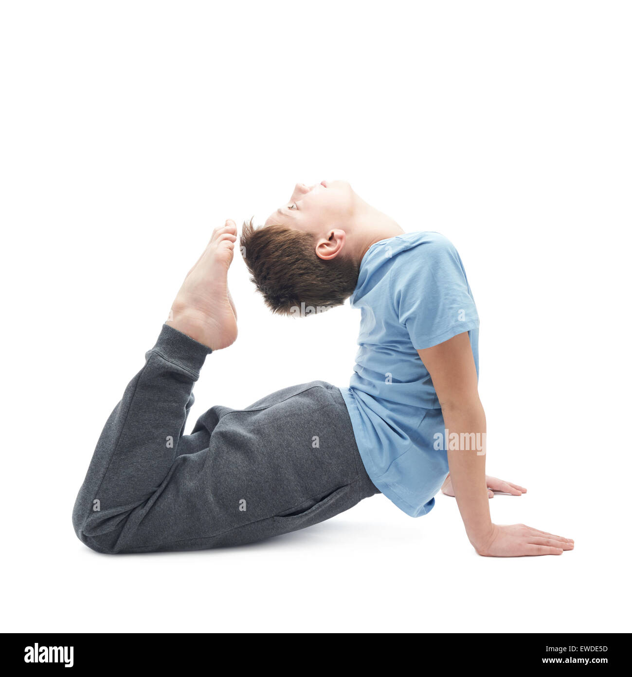 Young boy doing yoga Stock Photo - Alamy