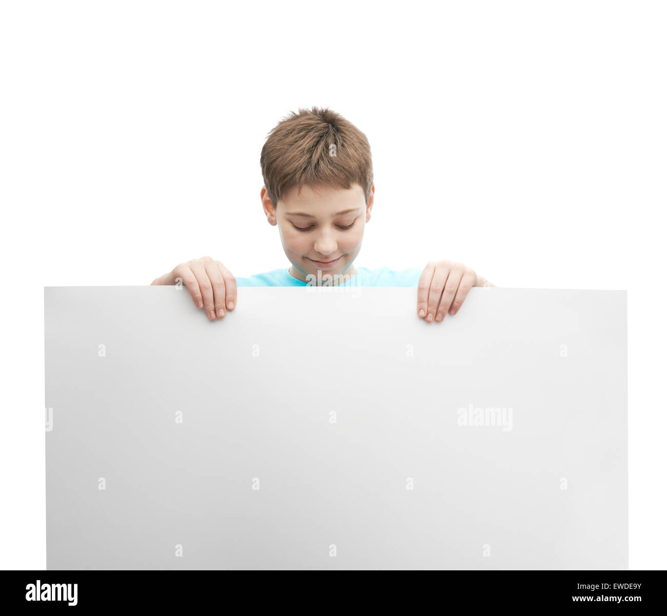 Happy young boy with a sheet of paper Stock Photo - Alamy