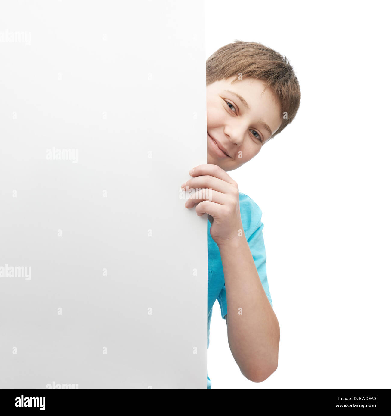 Smiling oung boy with a sheet of paper Stock Photo - Alamy