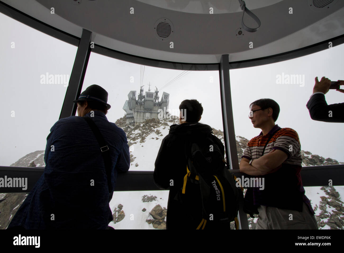 Courmayeur, Italy. 23rd June, 2015. Visitors approach Pointe Helbronner ...