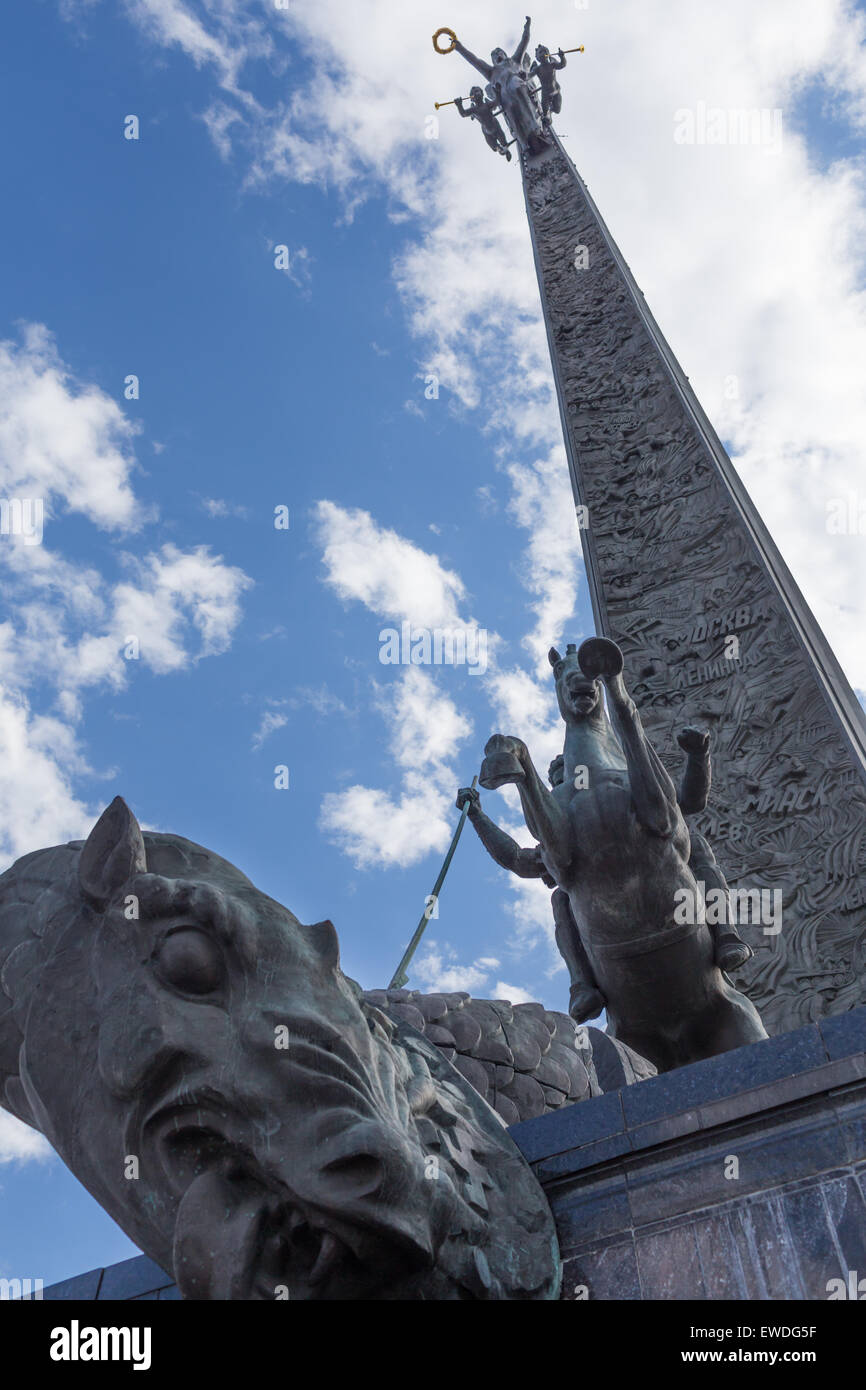 Sculture of St. George slaying the dragon, and an obelisk with a statue ...