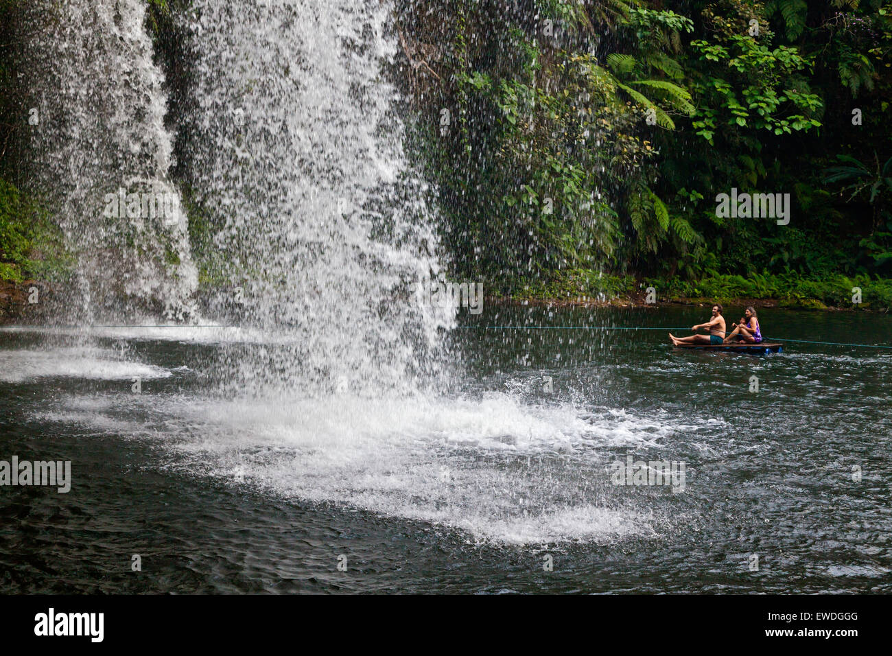 Fun under the CHAMPEE WATERFALL located on the BOLAVEN PLATEAU near ...
