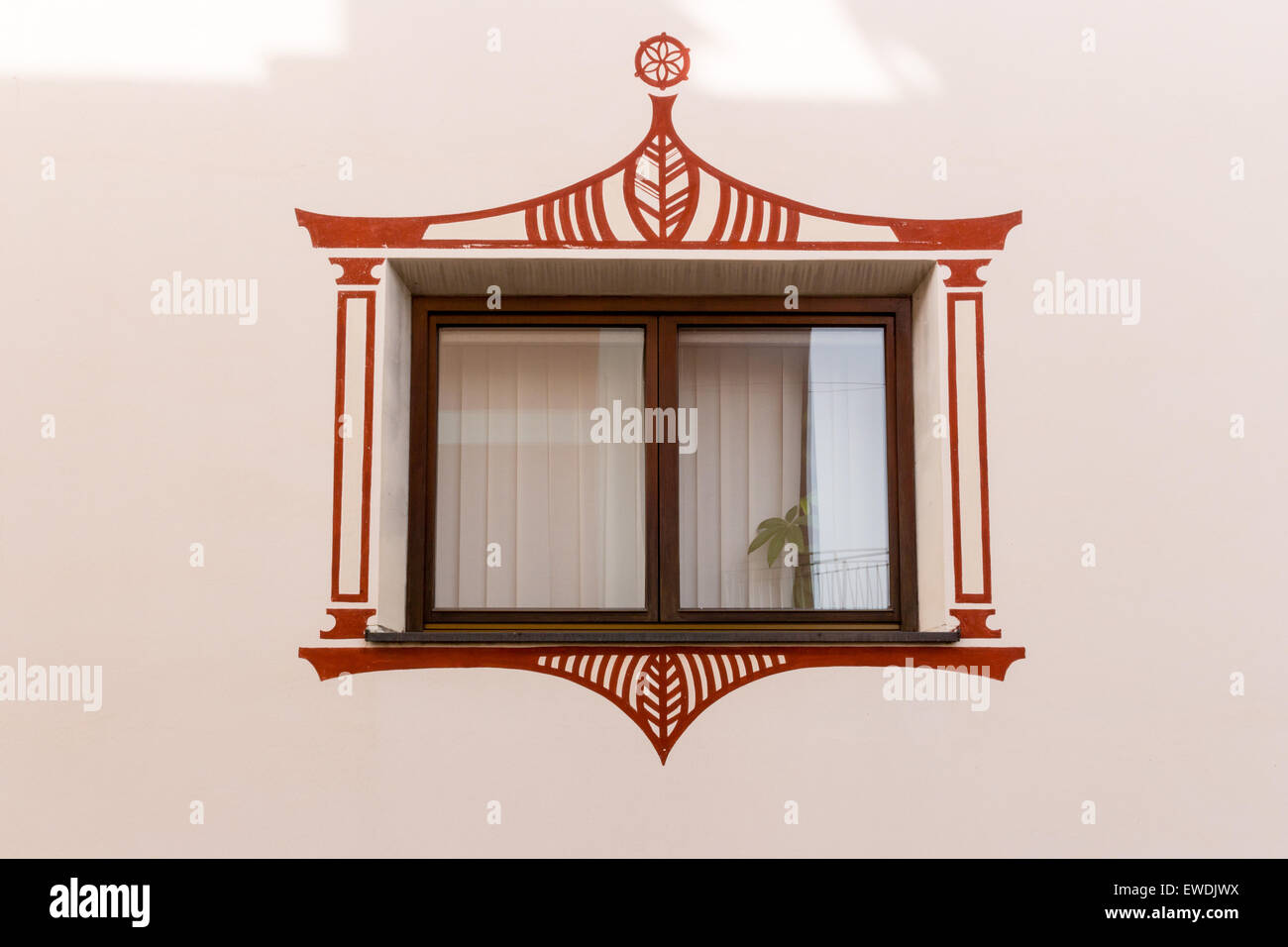 Modern Squared glass window with brown frame and artistic border with ...