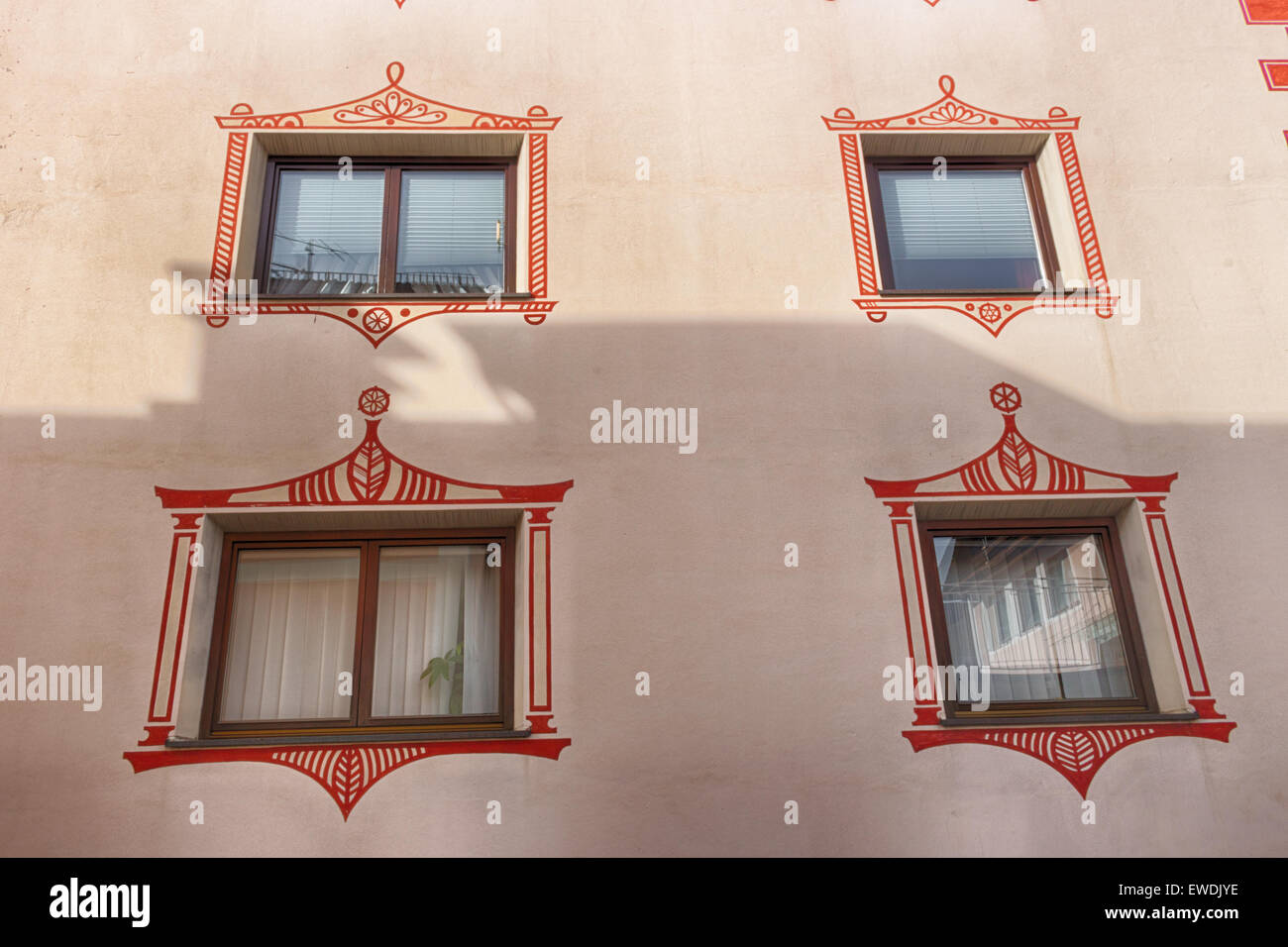 Modern Squared glass windows with brown frame and artistic border with ...