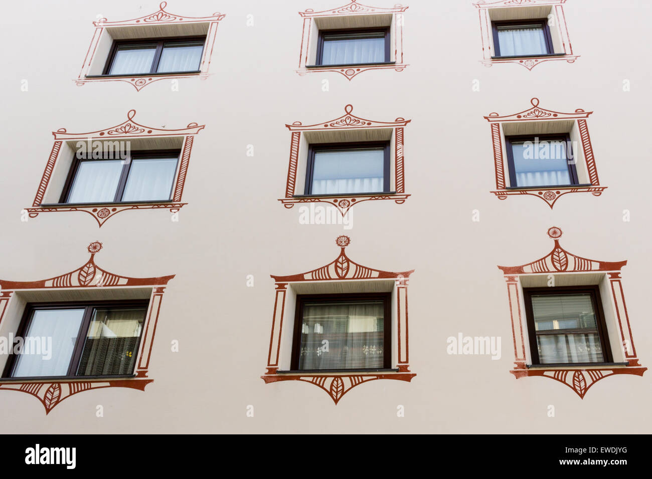 Modern Squared glass windows with brown frame and artistic border with ...