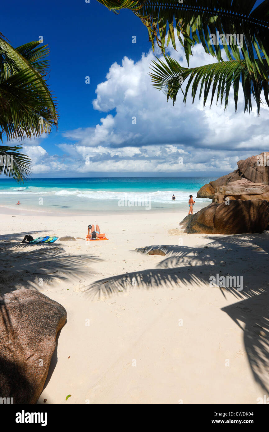 People on the sand beach, Seychelles, island La Digue Stock Photo - Alamy