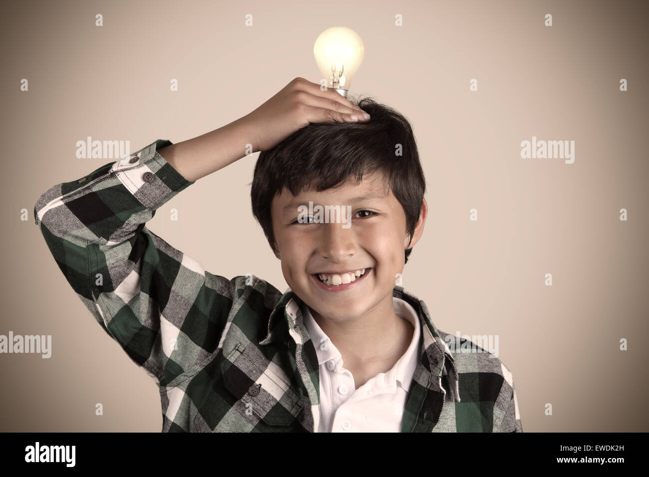 Young smiling boy has a bright idea Stock Photo - Alamy