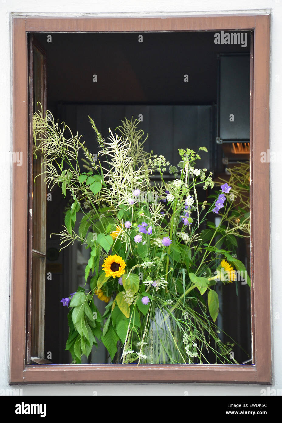 Old window with flowers Stock Photo - Alamy