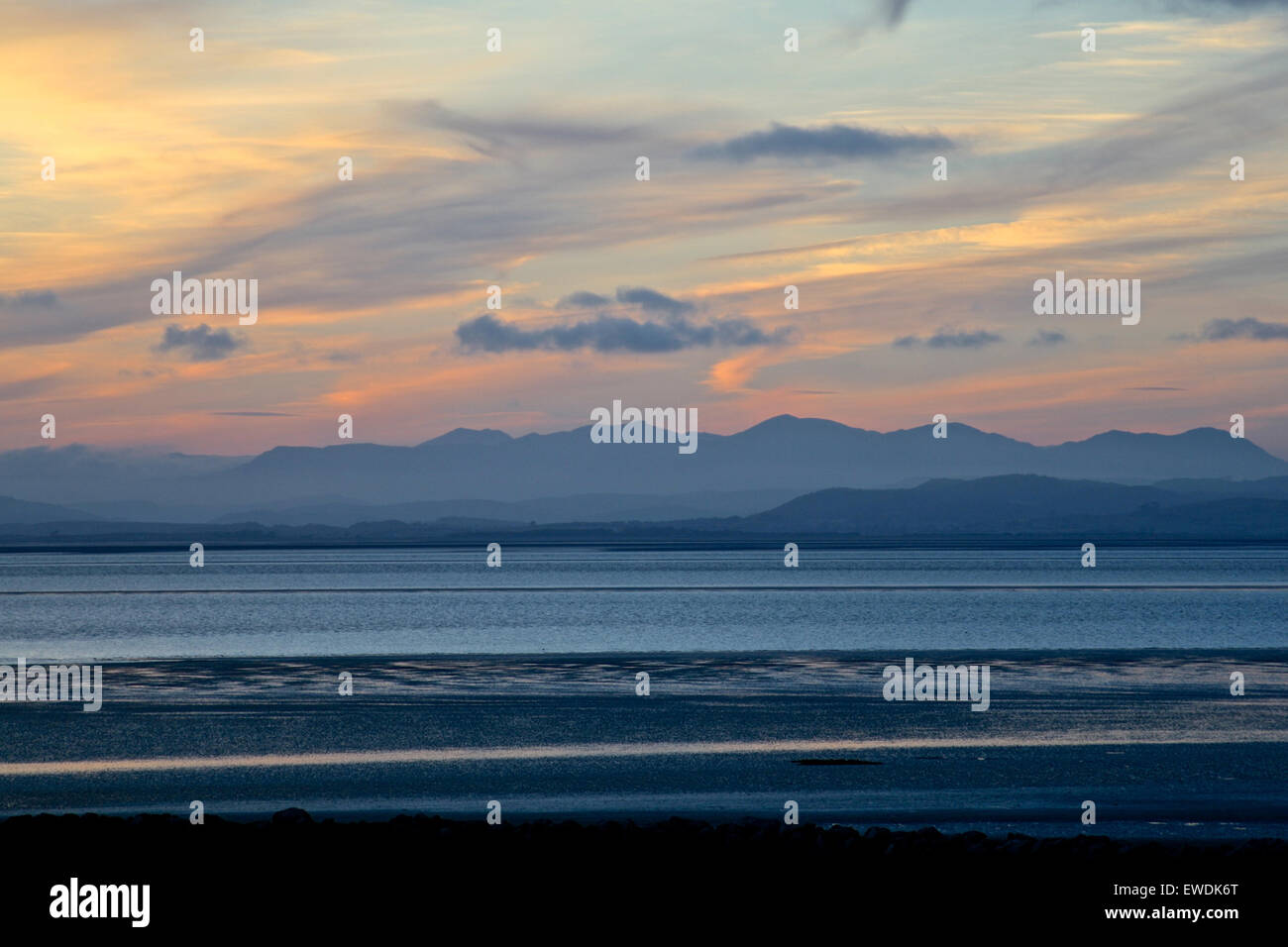 Sunset across Morecambe Bay looking towards the Lake District Fells ...