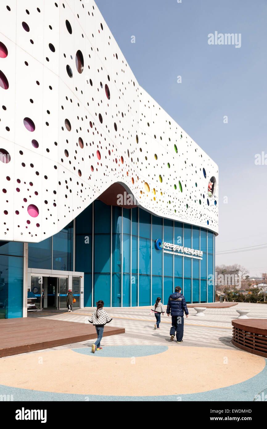 A man with his children walking by the entrance. Incheon Children ...
