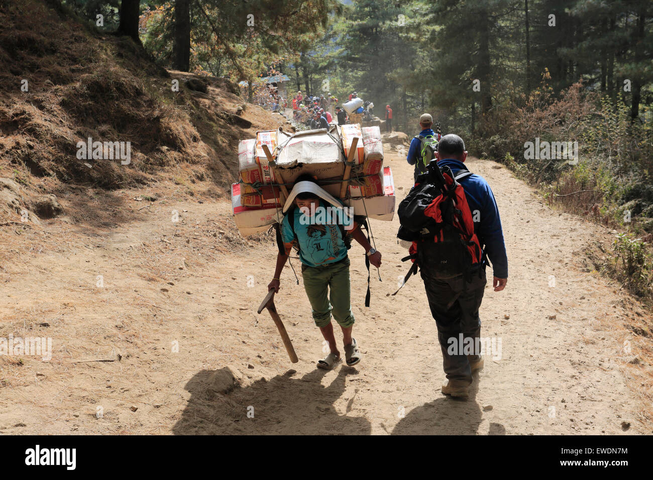 Nepalese sherpa carrying a load hi-res stock photography and images - Alamy