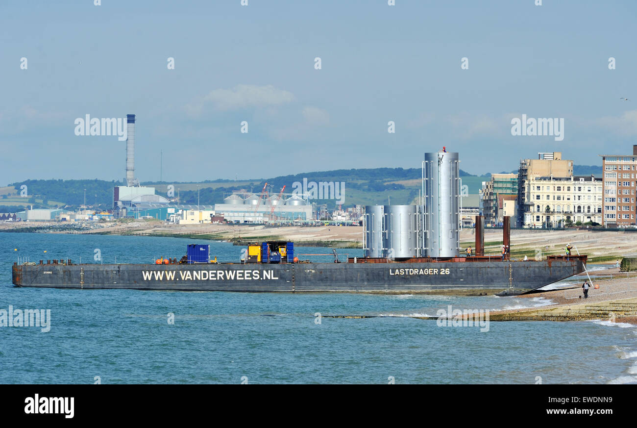 Brighton, UK. 24th June, 2015. A barge sitting by Brighton beach in the ...