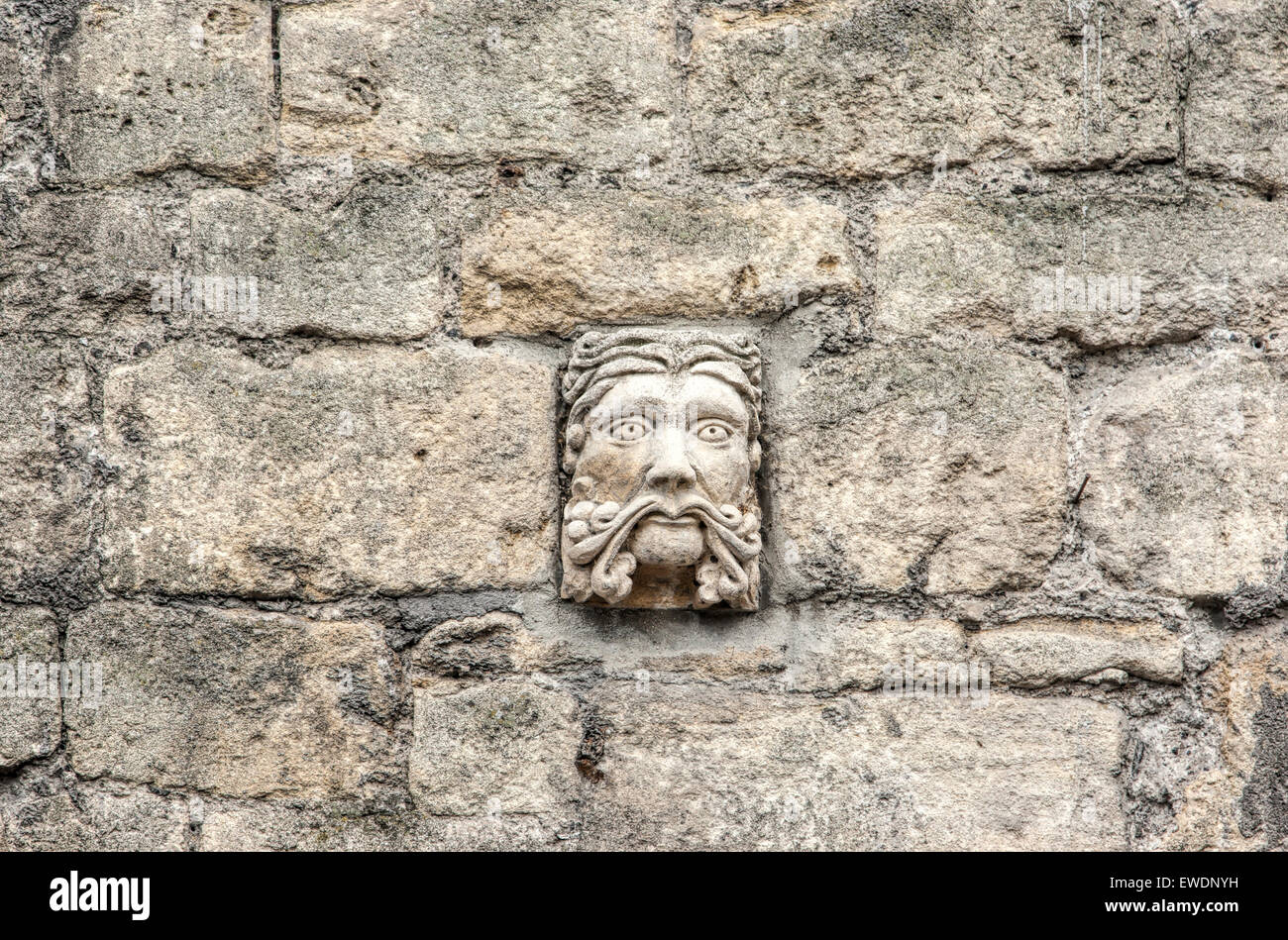 Carved stone face on wall hi-res stock photography and images - Alamy