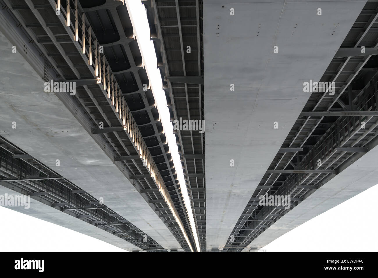 Underneath view and detail of a metal road bridge and sunlight Stock ...