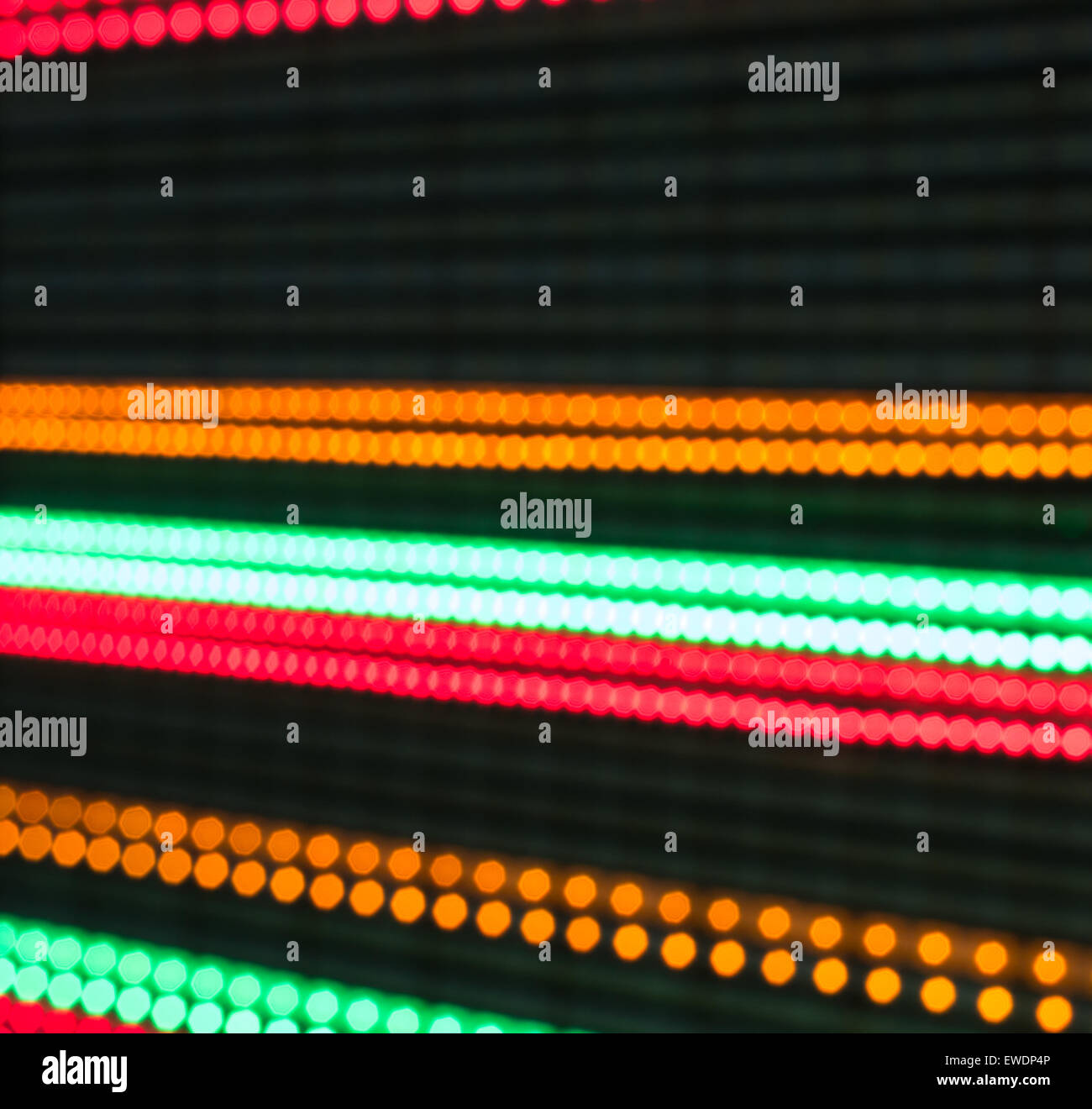 Lines of multicolored LED lights defocused bokeh style Stock Photo - Alamy