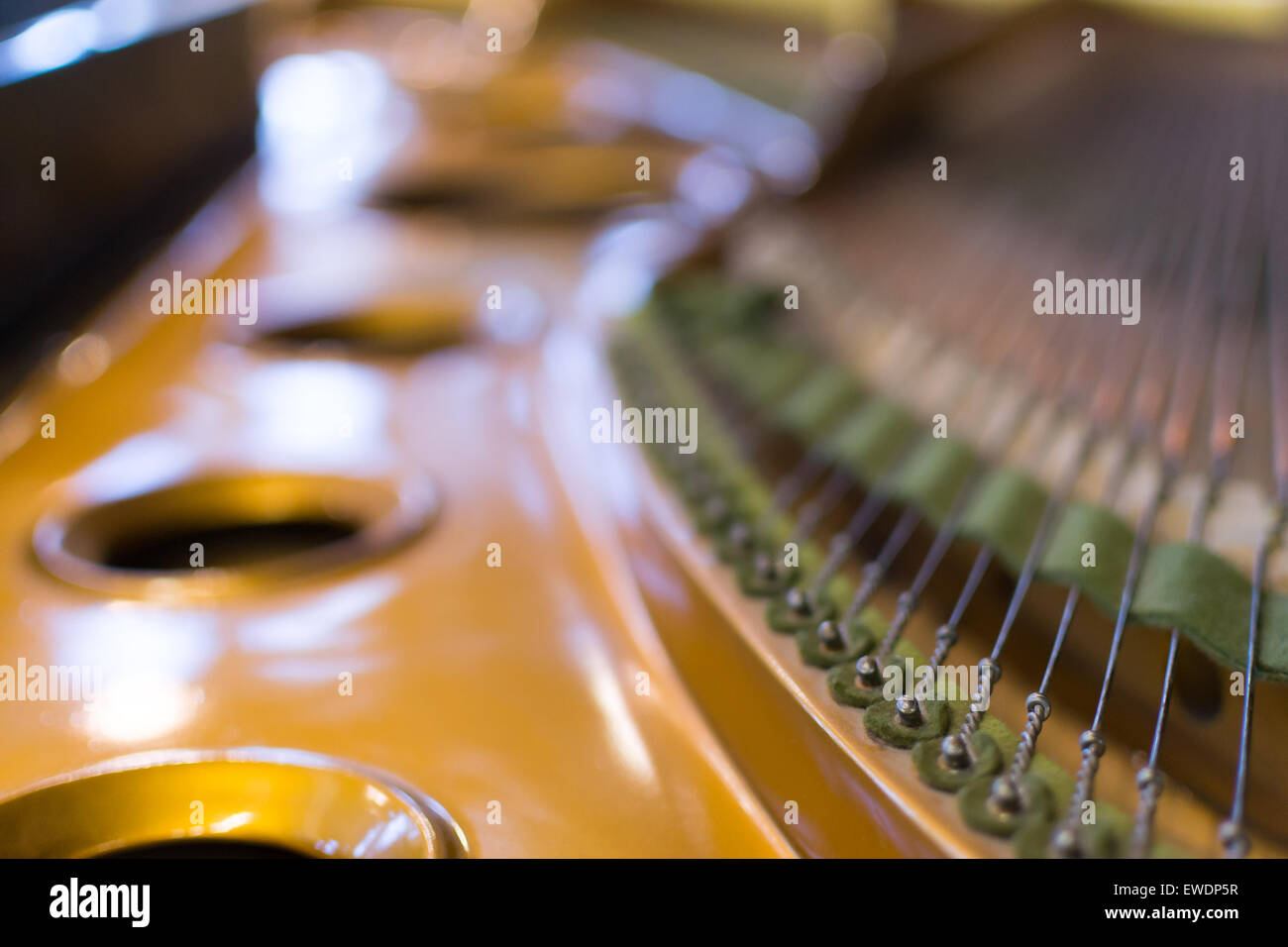 Detailed image of the strings of a classical Grand Piano in close-up ...
