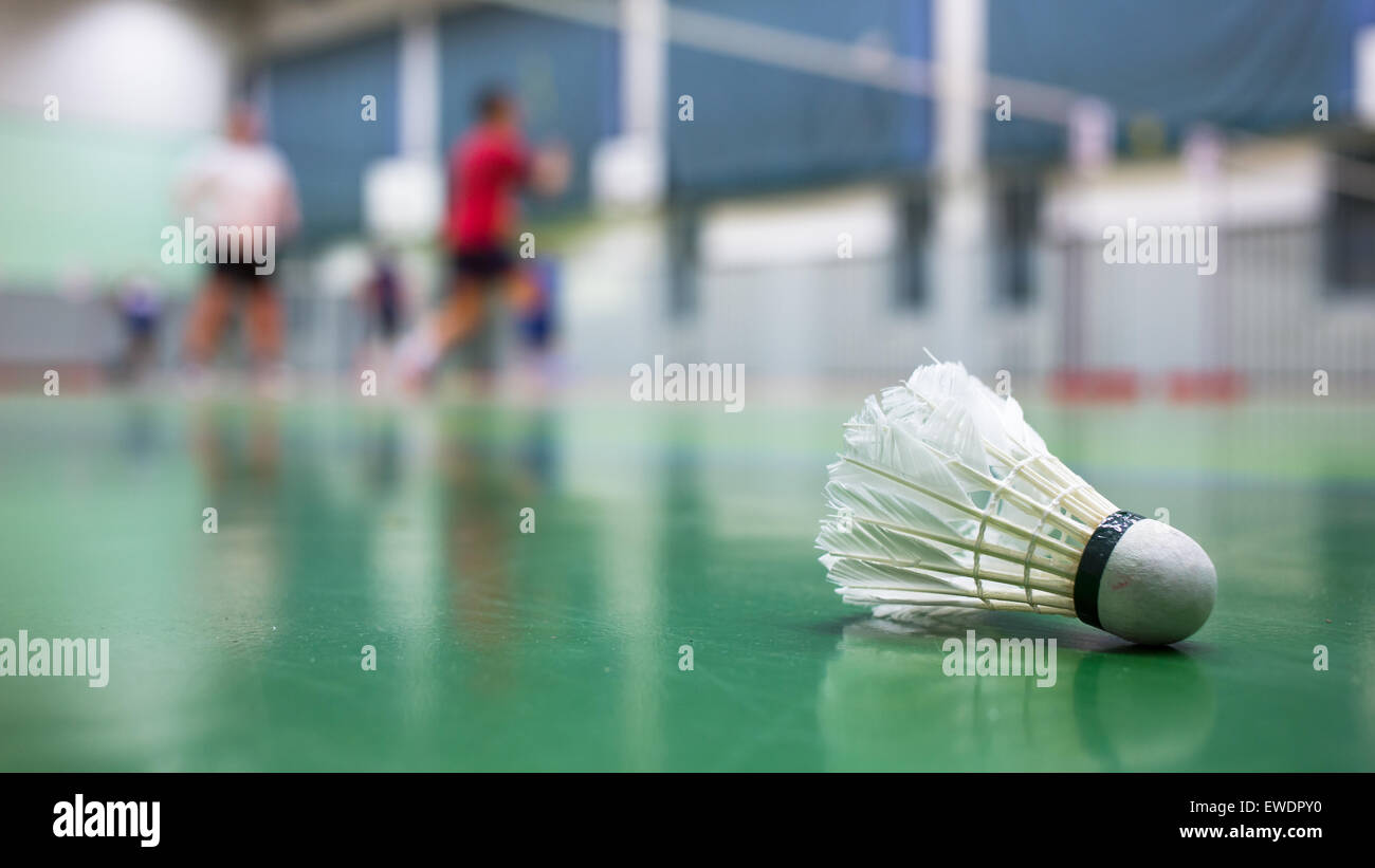 Badminton - badminton courts with players competing Stock Photo - Alamy